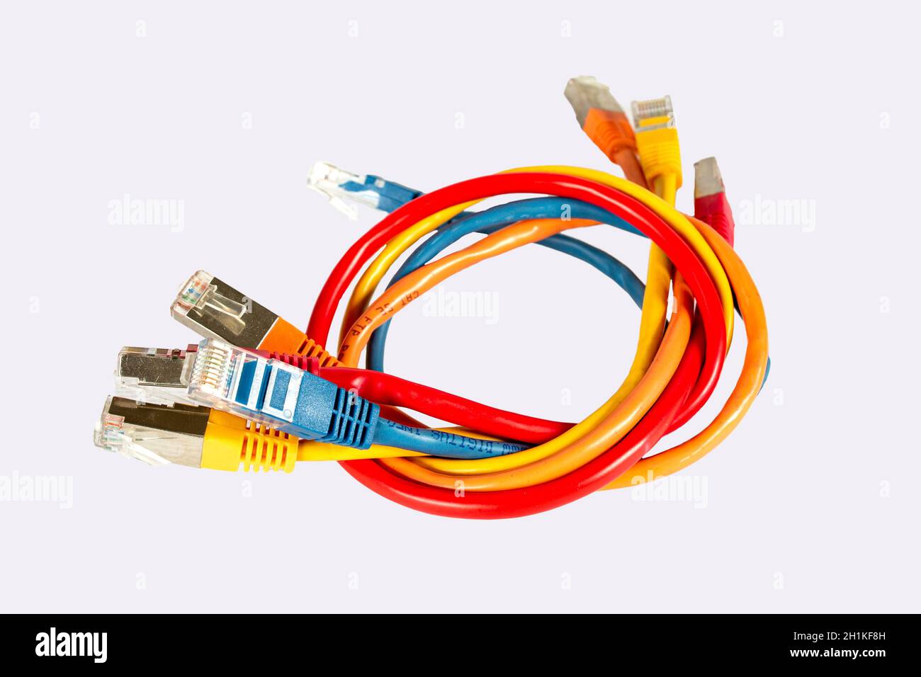 Multi-colored cables for a computer network twisted together. Isolated ...