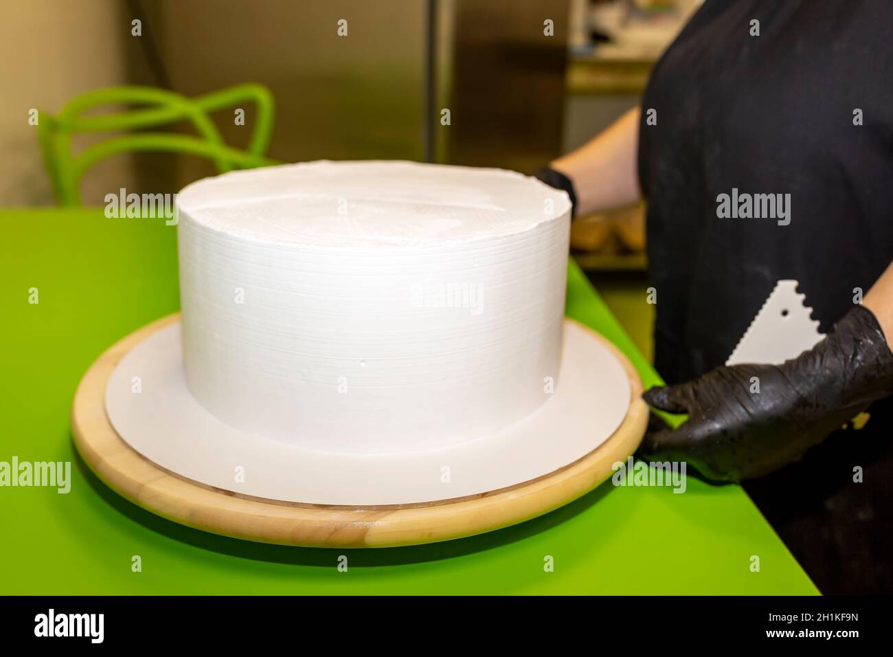 Cake cooking. The chef cook makes the mold for the preparation of a ...