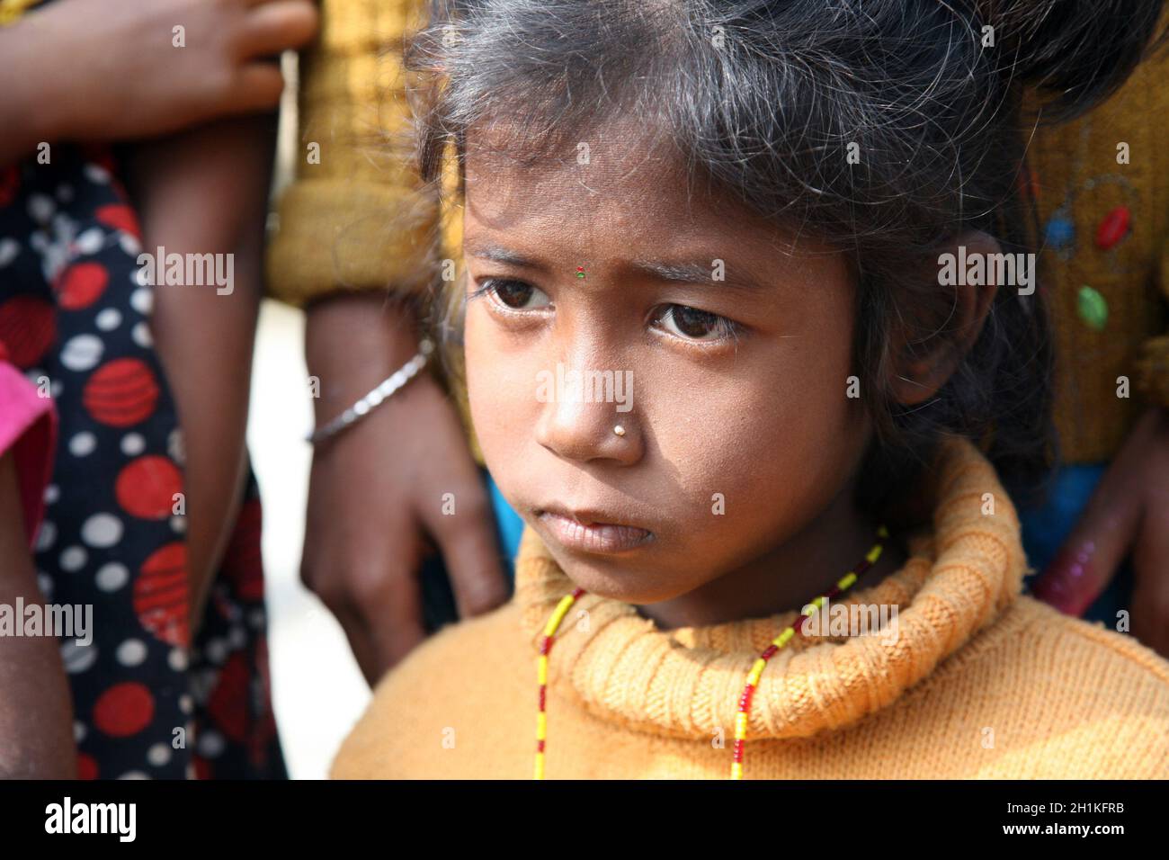 Portrait of tribal children in a village Kumrokhali, India Stock Photo ...