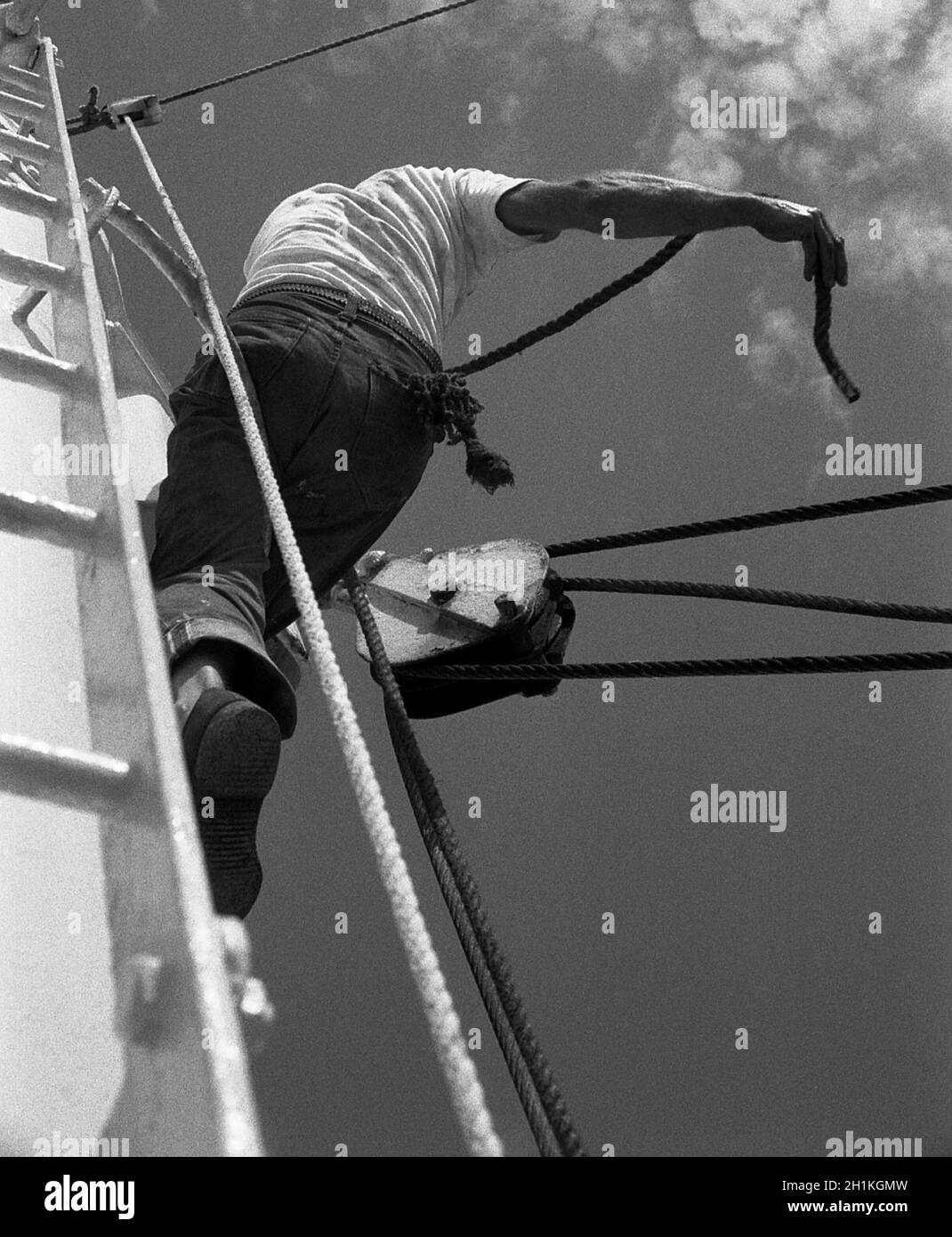 AJAXNETPHOTO. AT SEA, ATLANTIC OCEAN. - HIGH RISK JOB - AN ABLE SEAMAN ...