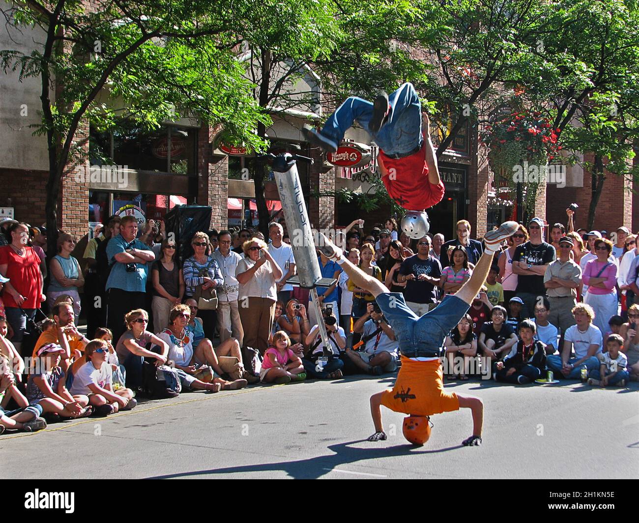 Performing Acrobat On the Street Festival Stock Photo - Alamy