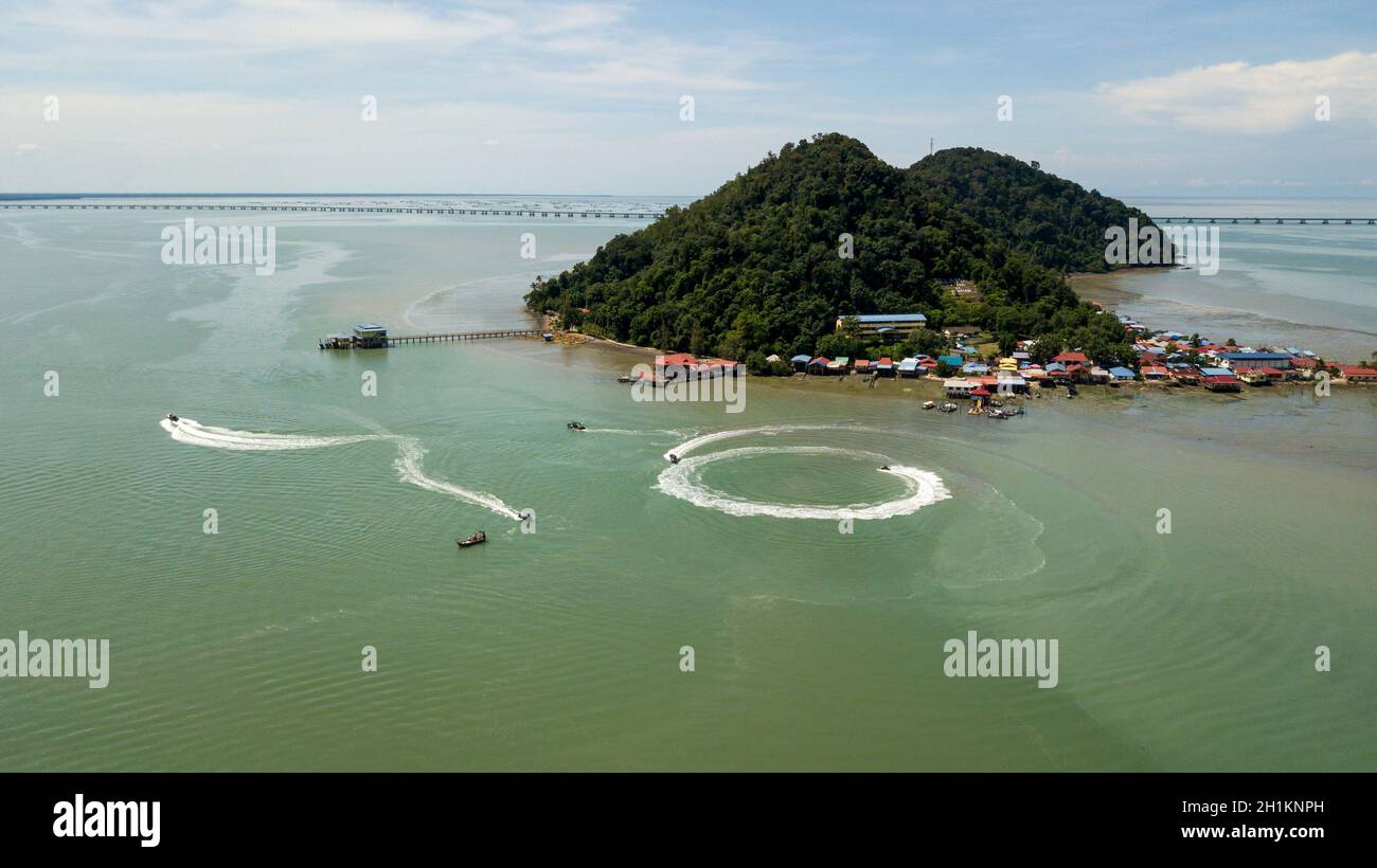 Pulau Aman, Penang/Malaysia - Oct 19 2019: Aerial fishing boat move at ...