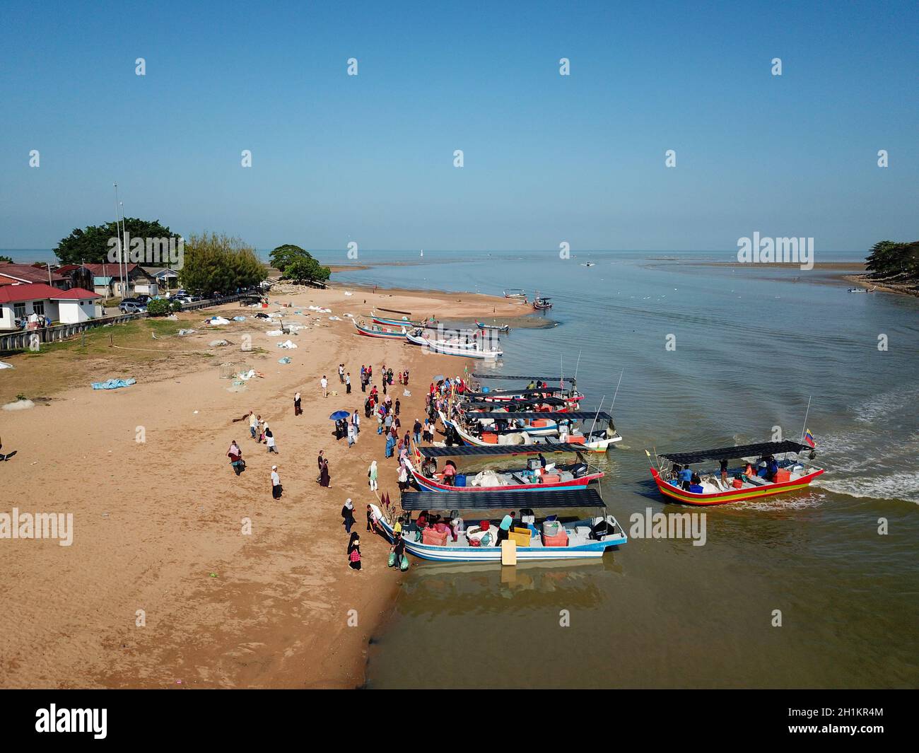 Penaga, Penang/Malaysia - Mar 14 2020: A boat come back from sea to ...