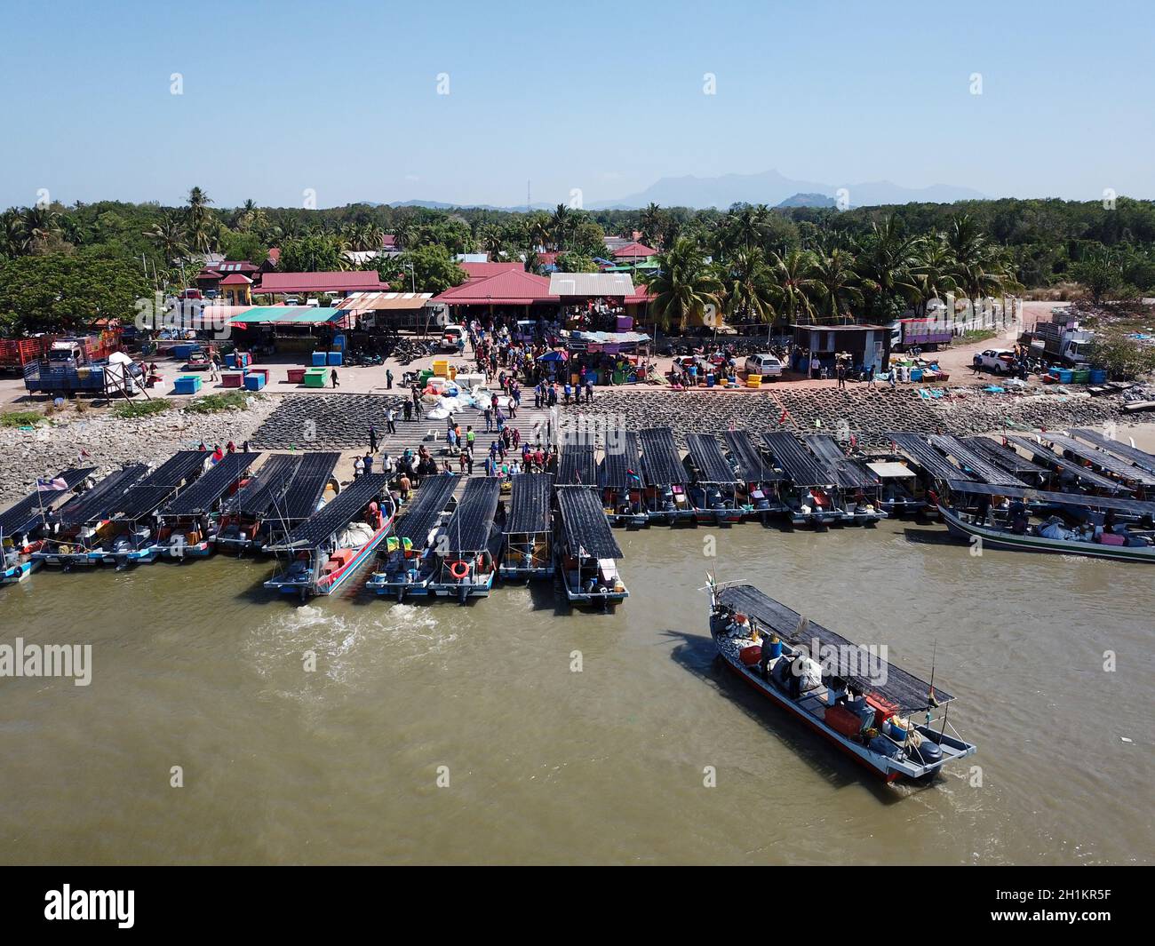 Penaga, Penang/Malaysia - Mar 14 2020: A fishing boat back to jetty ...