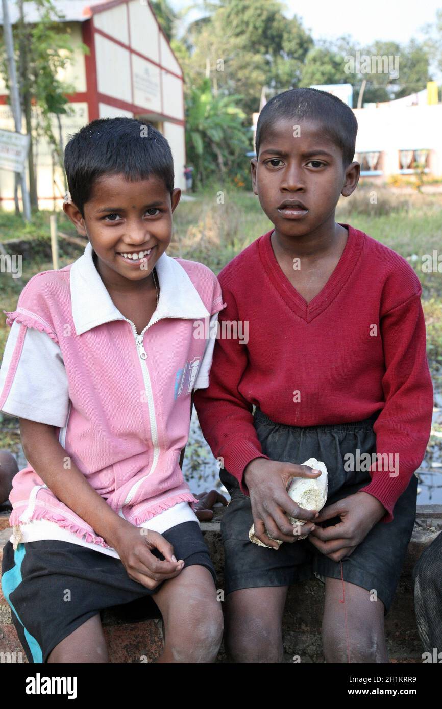 Portrait of tribal children in a village Kumrokhali, India Stock Photo ...