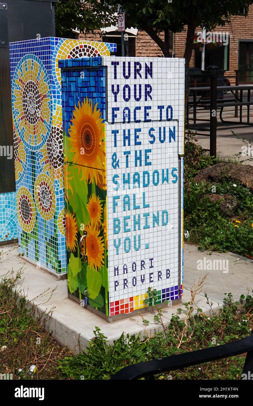 Metal utility boxes decorated with colorful tiles, paint, designs, and ...