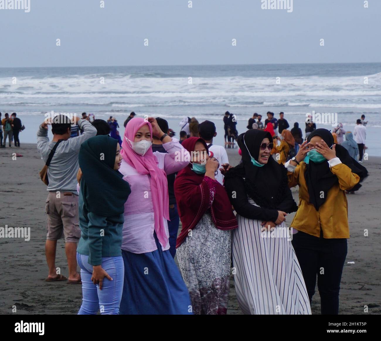 people vacation on parang tritis, yogyakarta, indonesia Stock Photo - Alamy