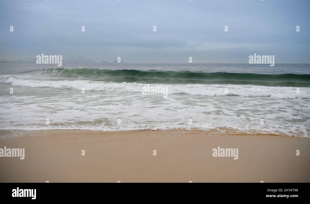 Ocean surf on the beach of Copacabana. Rio de Janeiro, February 2020 ...
