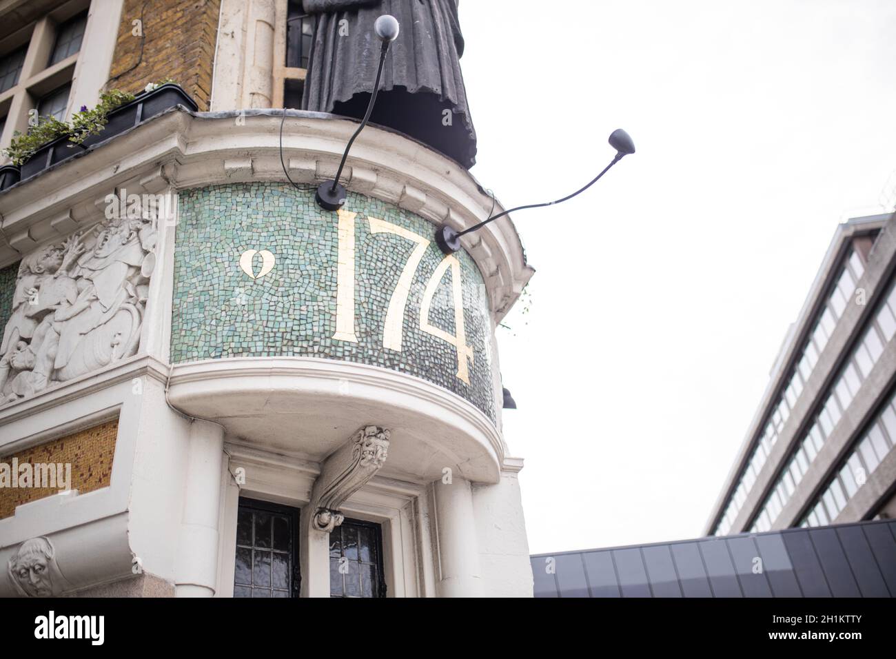 Landscape low angle picture of the corner of a classic British pub with ...