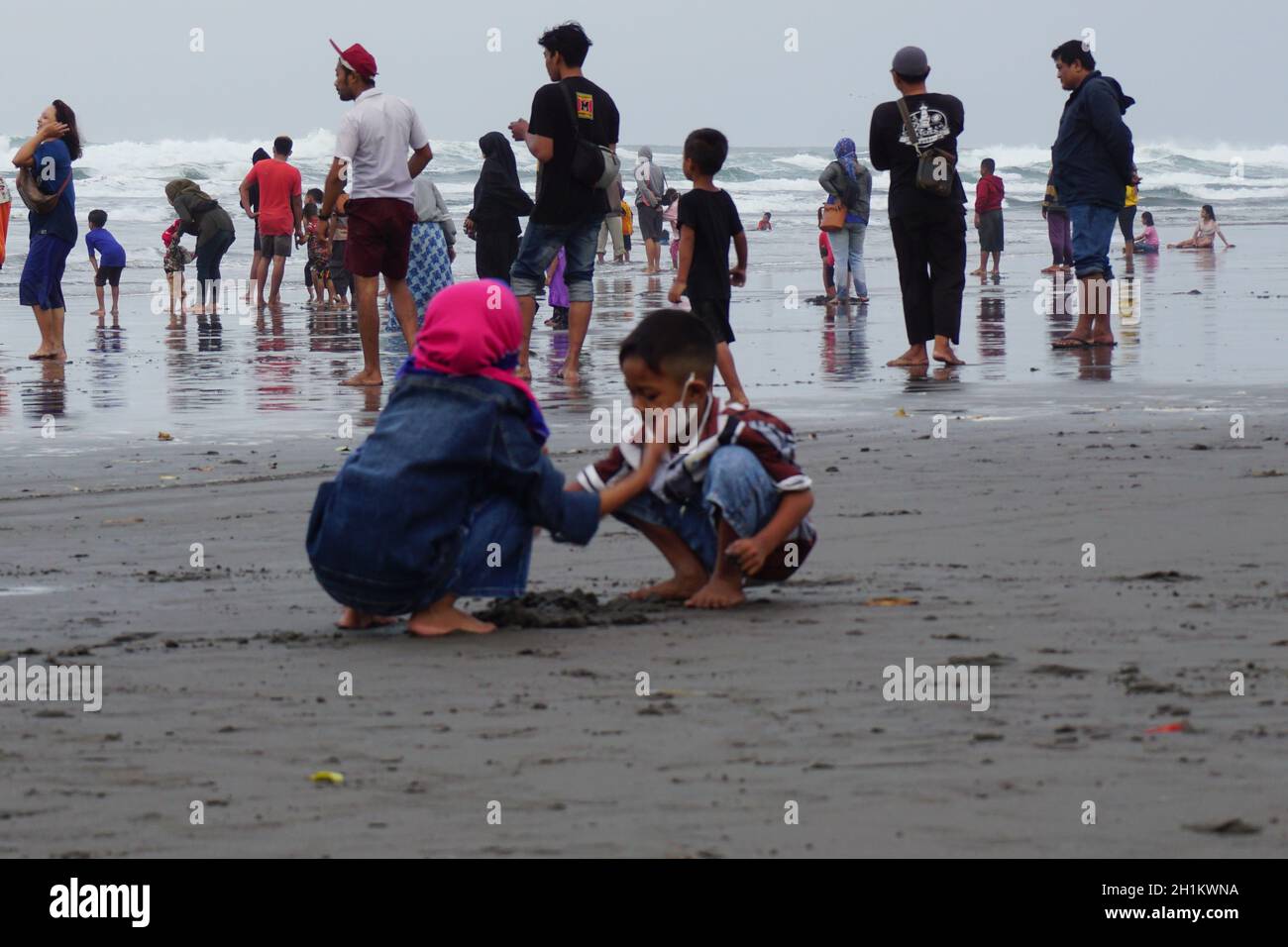 people vacation on parang tritis, yogyakarta, indonesia Stock Photo - Alamy