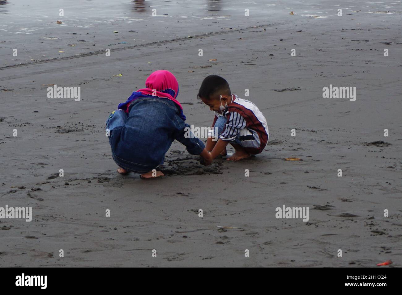 people vacation on parang tritis, yogyakarta, indonesia Stock Photo - Alamy