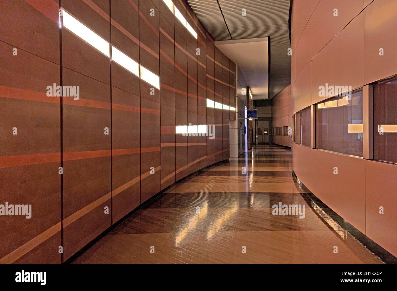 Modern building corridor with wall lighting Stock Photo - Alamy