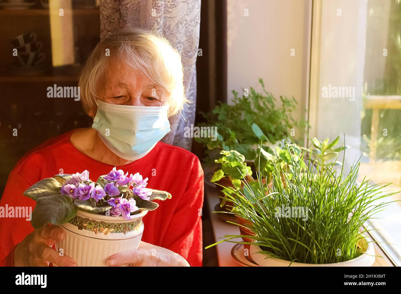 The Covid-19, health, safety and pandemic concept - senior old lonely ...