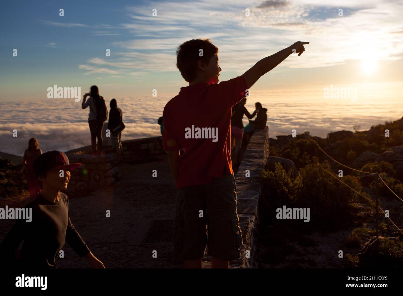 Teenagers watching sunset hi-res stock photography and images - Alamy