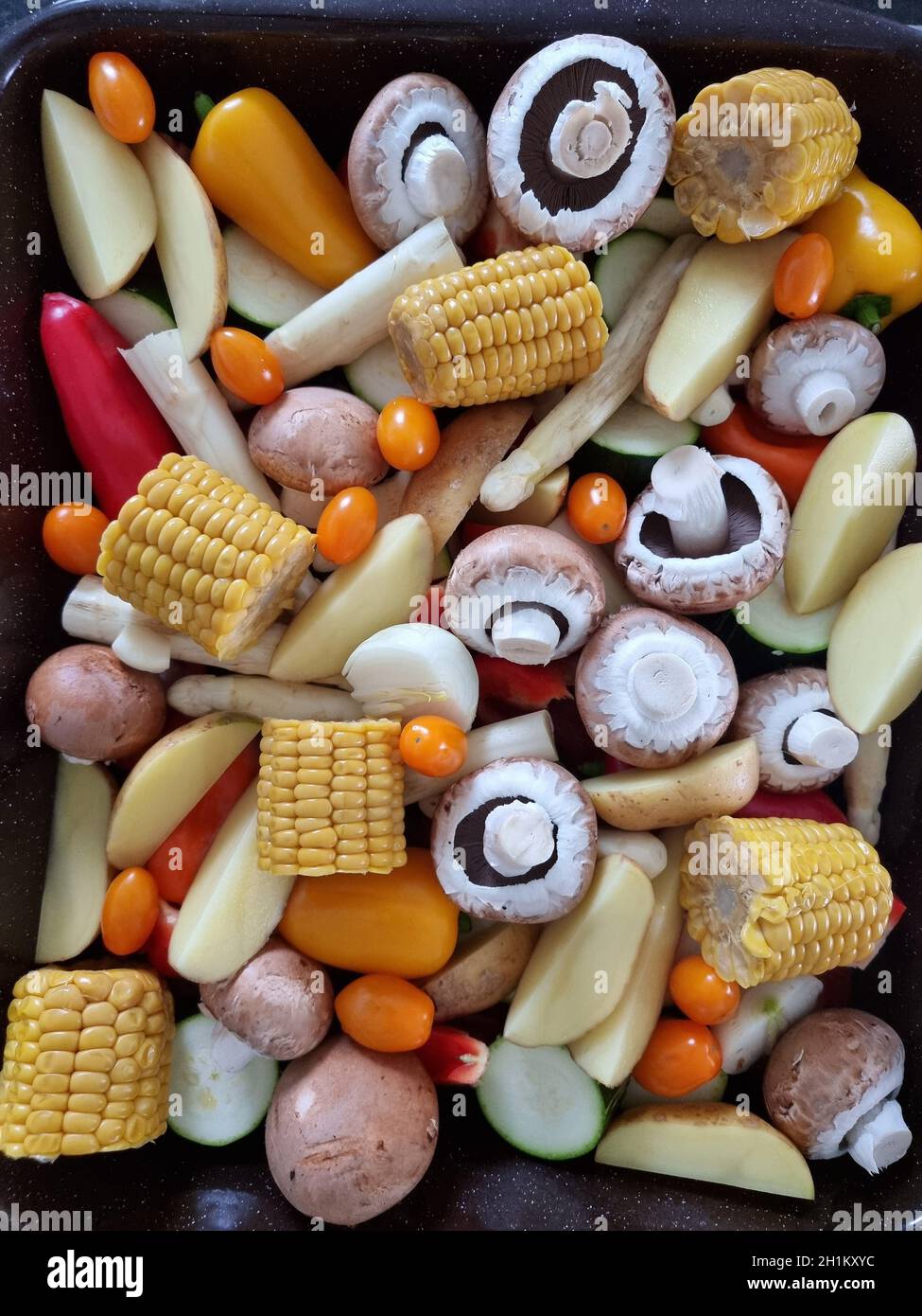 Cut vegetables prepared for baking Stock Photo - Alamy