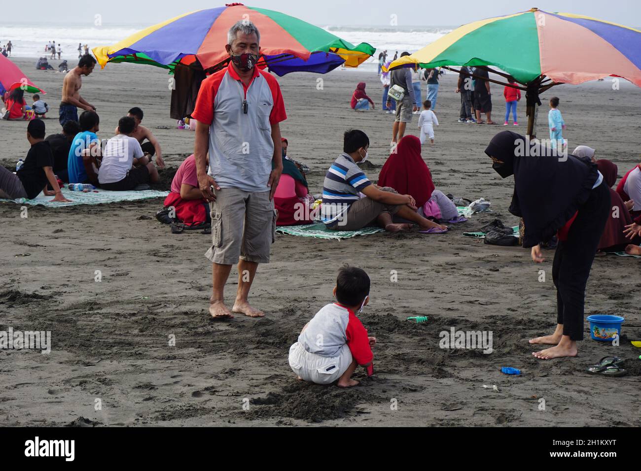 people vacation on parang tritis, yogyakarta, indonesia Stock Photo - Alamy