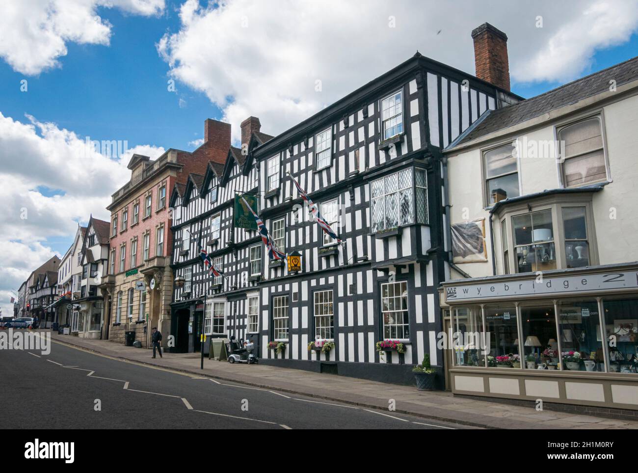 View of ancient timber framed buildings in the High Street in the ...