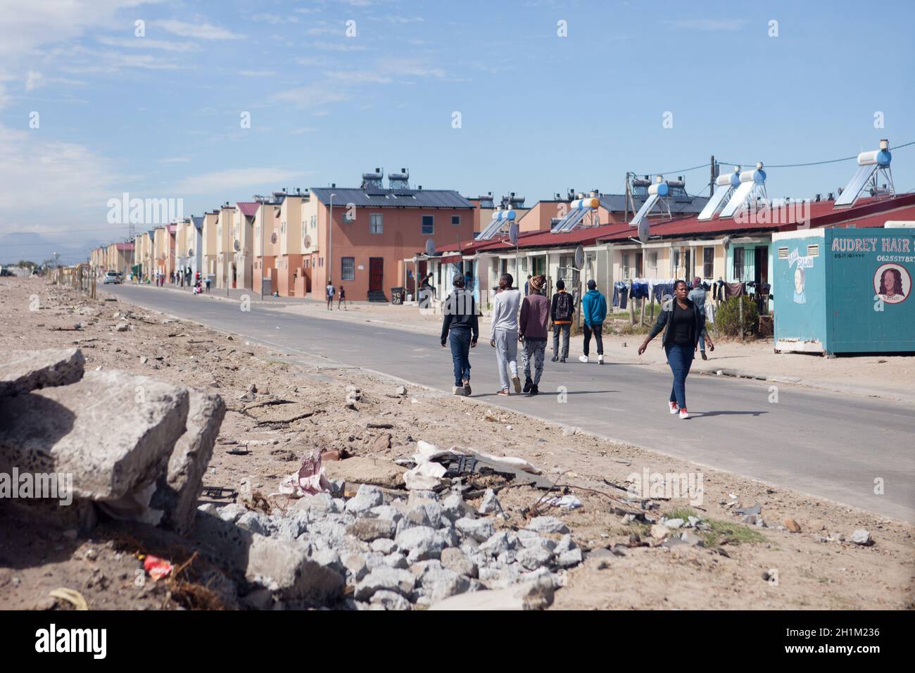 Locals walking in Gugulethu Stock Photo - Alamy