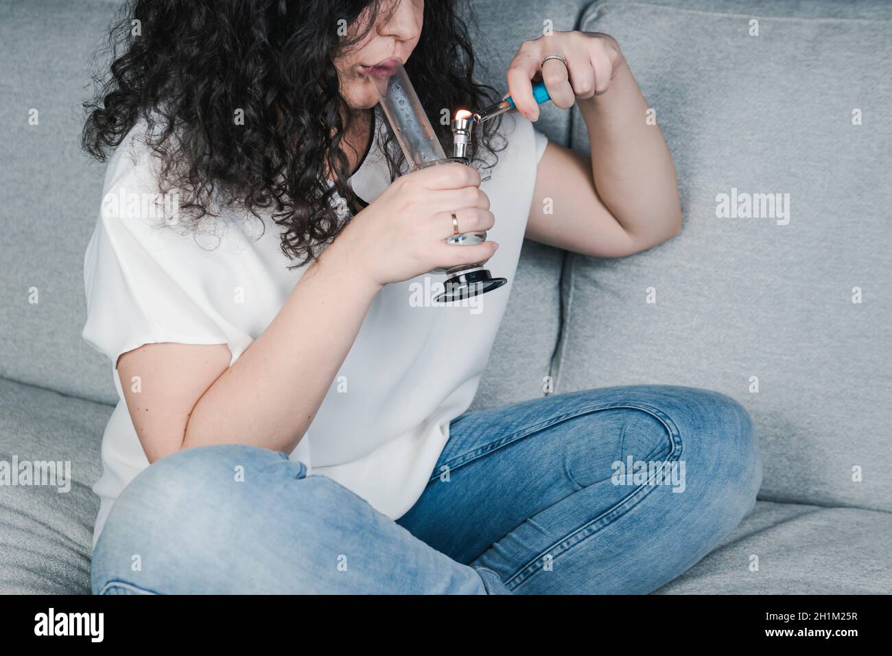 Woman smoking hashish hi-res stock photography and images - Alamy