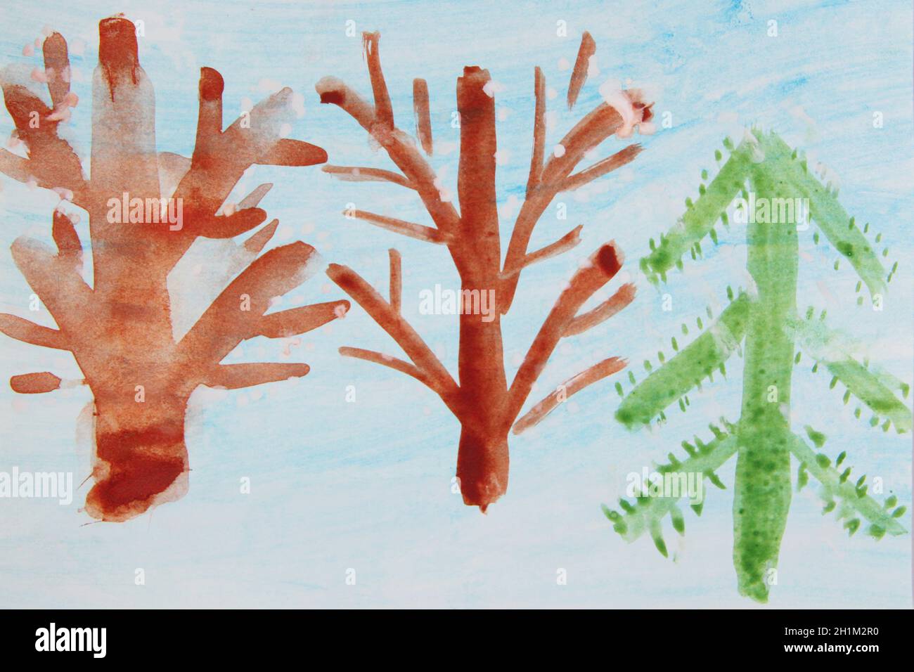 Children's drawing with brown trees and New Year tree on blueish ...