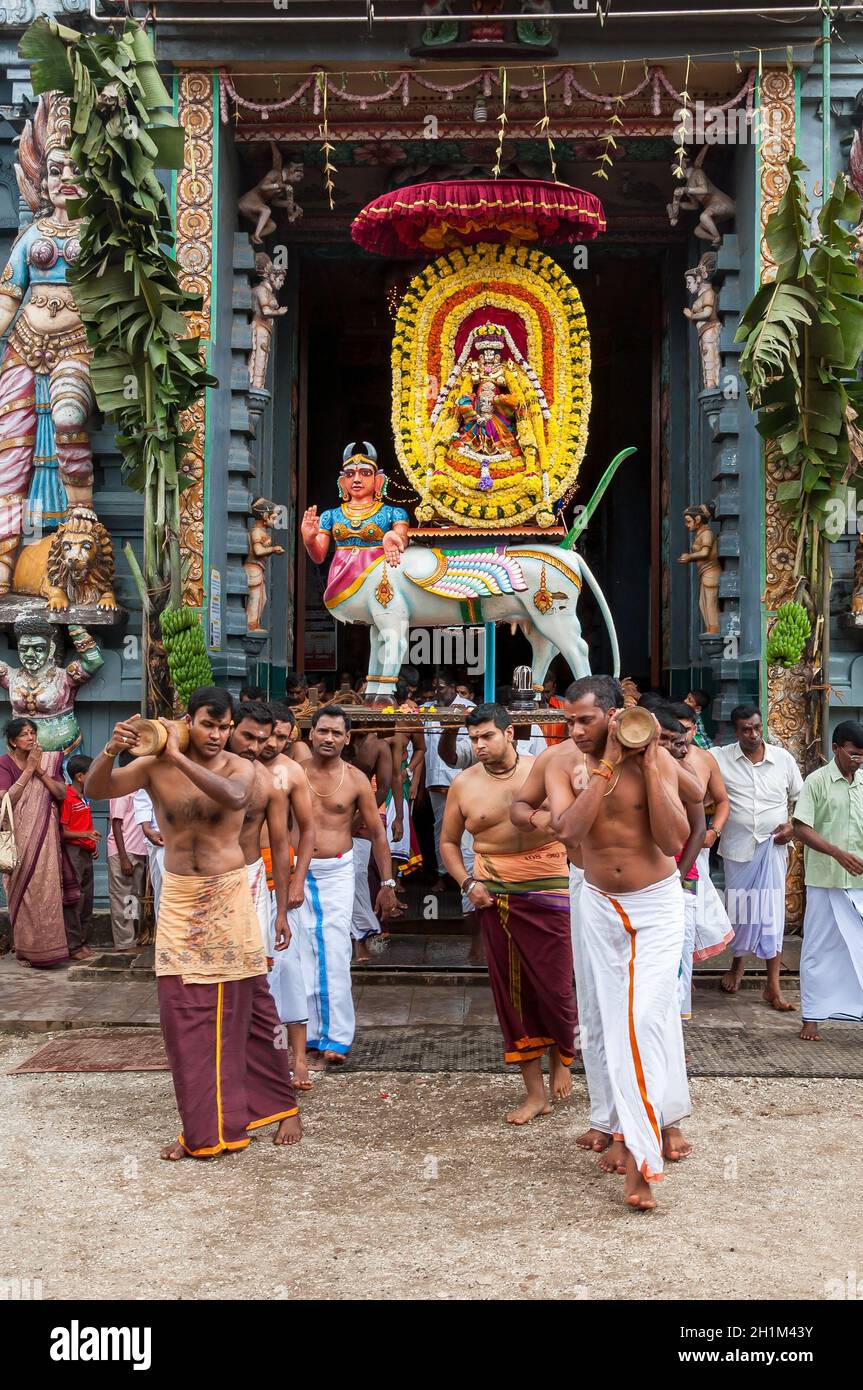 Matale, Sri Lanka - February 16, 2013: The men take the religious icon ...