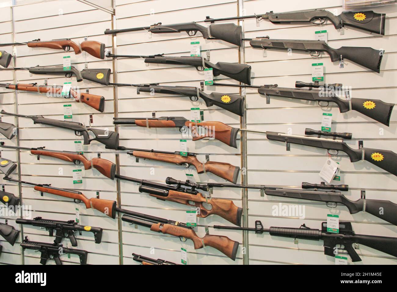 Hunting and sporting guns presented at exhibition for sale. Wide ...
