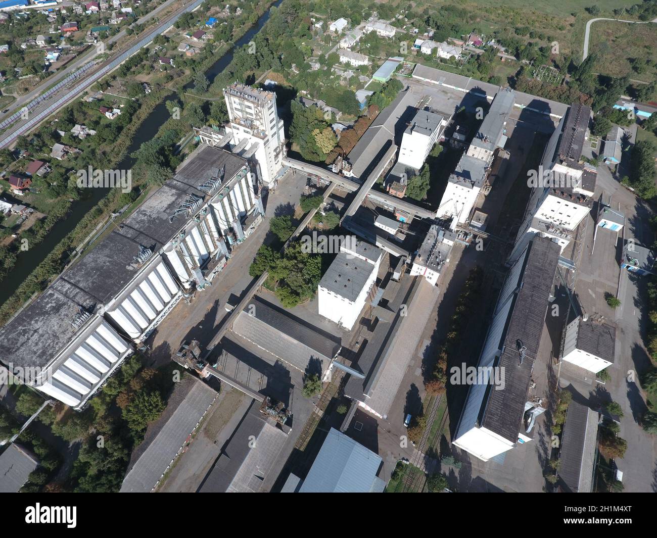 Top view of a silo elevator. The huge building for storing and drying ...