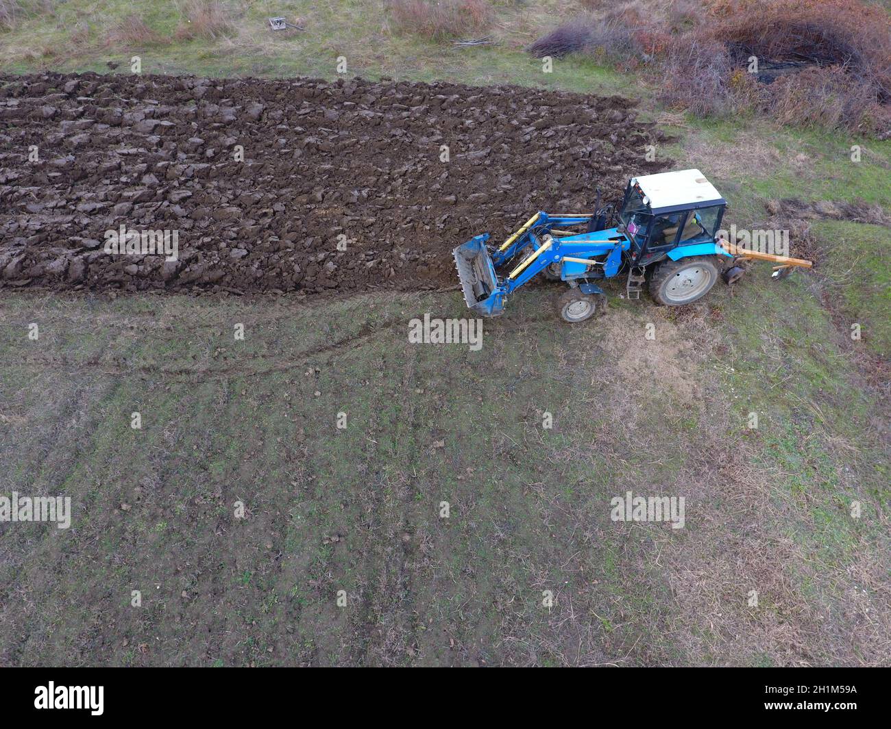 Back view farm tractor plough hi-res stock photography and images - Alamy