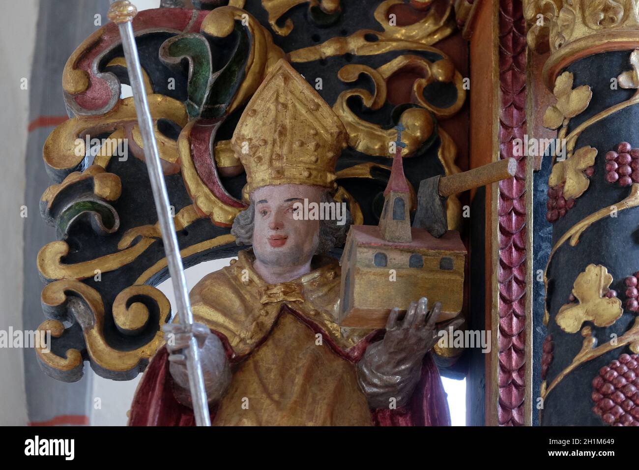 Saint Ambrose statue on the main altar in the chapel of St. Wolfgang in ...