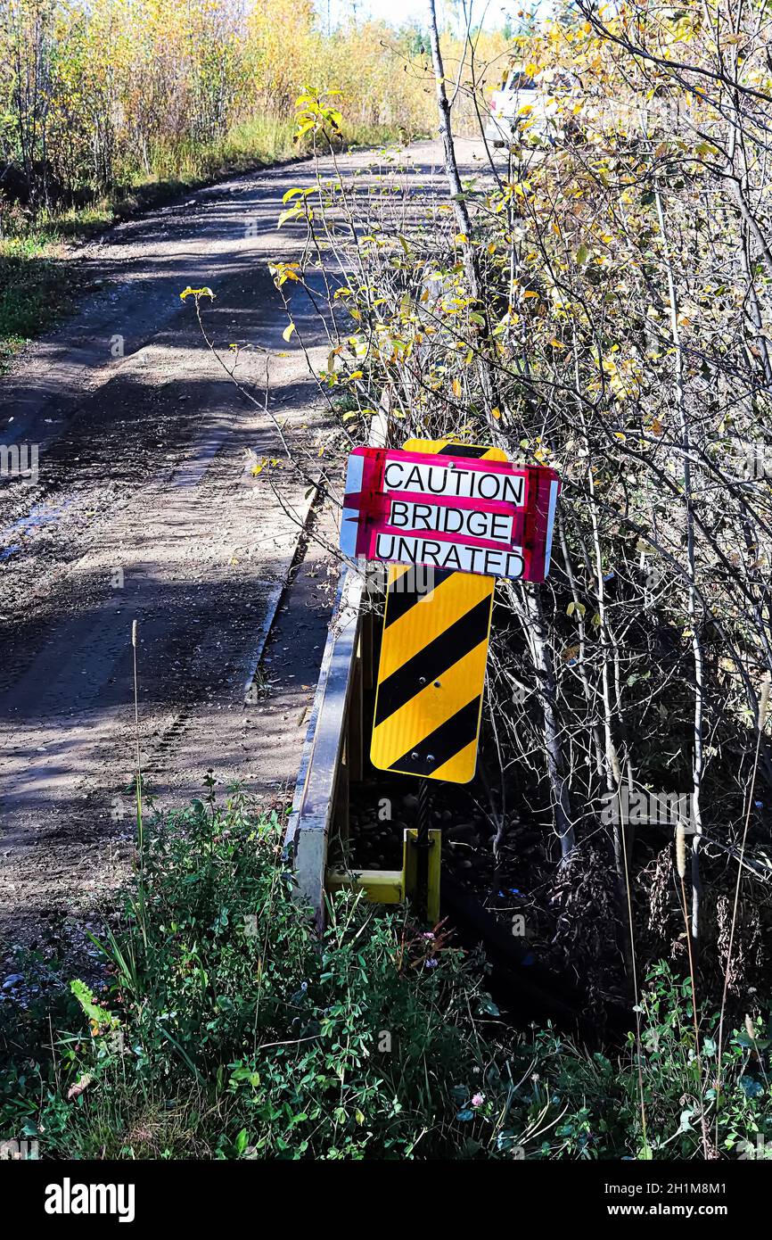 A handmade Caution Bridge Unrated warning sign Stock Photo - Alamy