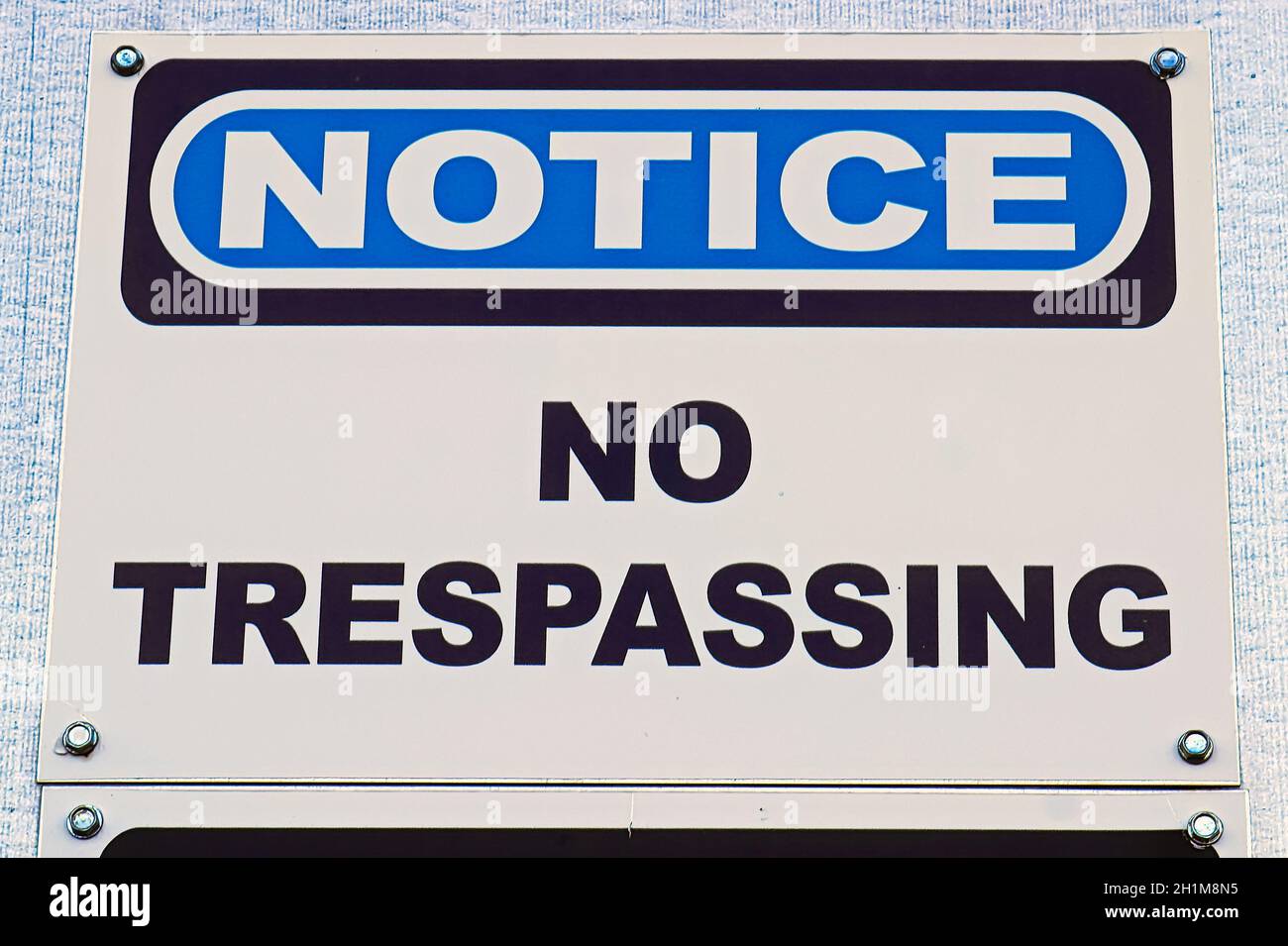 Closeup fo a Notice No Trespassing sign Stock Photo - Alamy