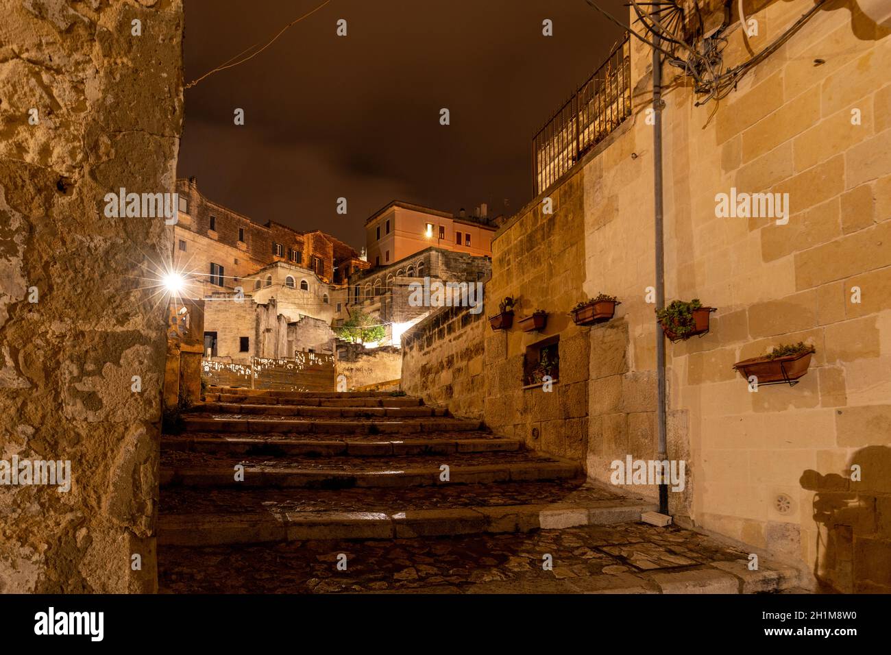 Matera, Italy - September 19, 2019: Typical cobbled stairs in a side ...