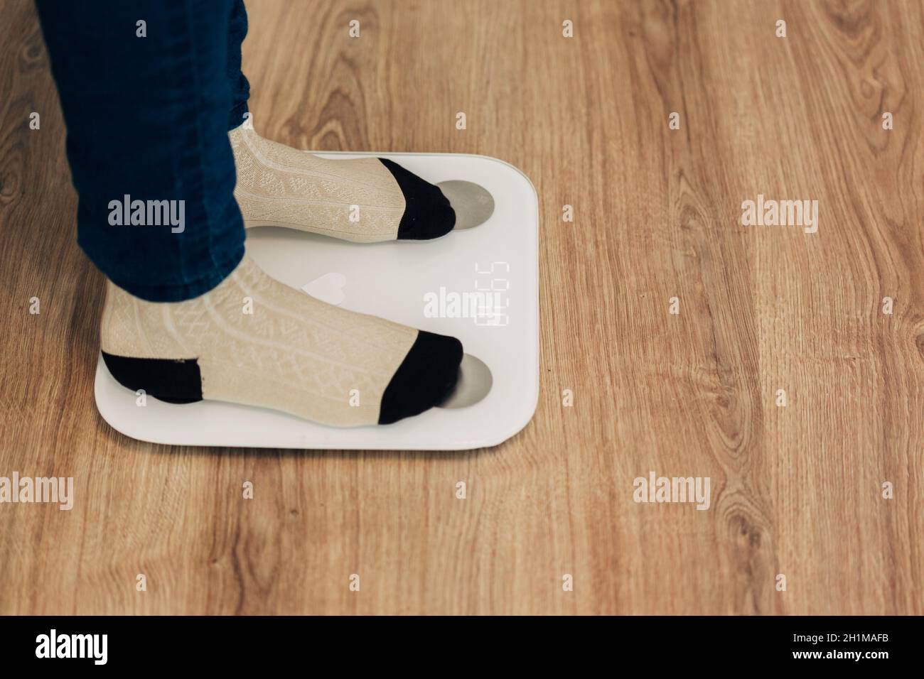 Modern Electronic Device. Girl Measures Weight on Smart Scales Stock ...