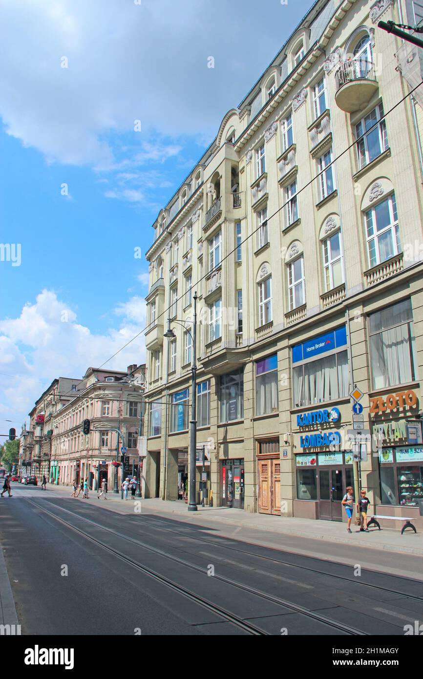 Residential street with beautiful buildings in Lodz. City life in Lodz ...