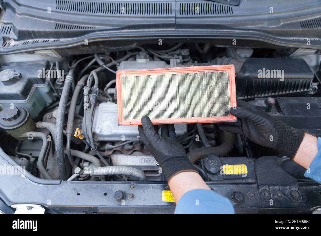 Dirty car engine air filter Stock Photo - Alamy