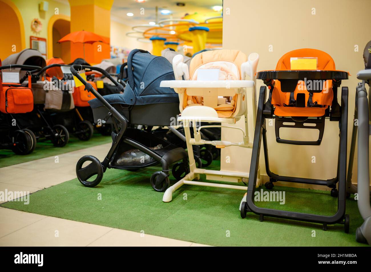 Baby strollers assortment in children's store. Showcase with ...