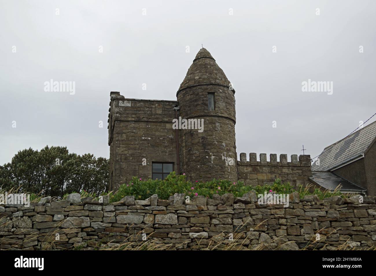 Looking inland, the Classiebawn Castle is set against the backdrop of ...