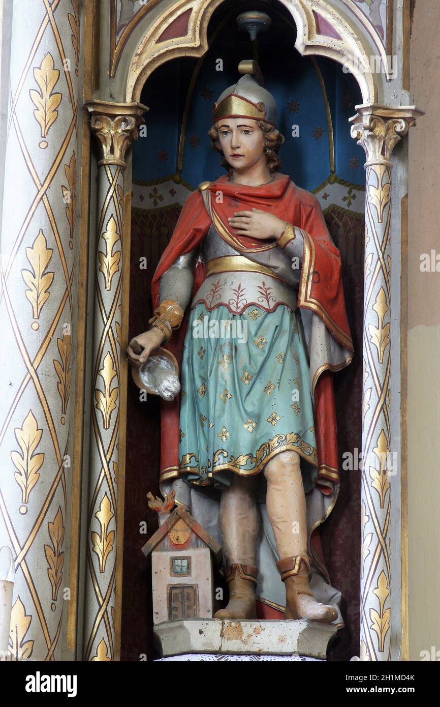 Saint Florian, statue on the altar of the Sacred Heart of Jesus in the ...