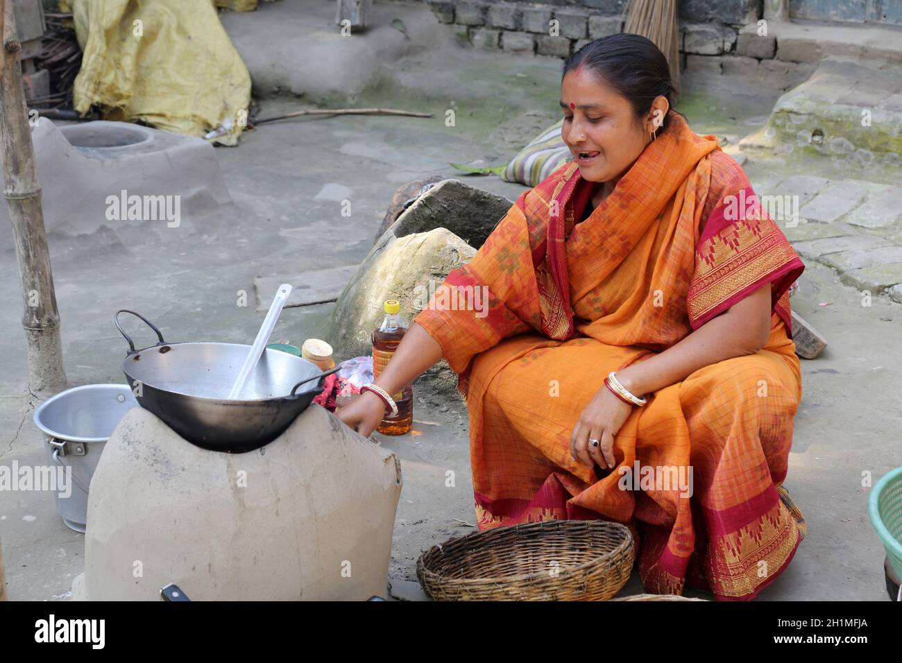 Indian old woman cooking food hi-res stock photography and images - Alamy