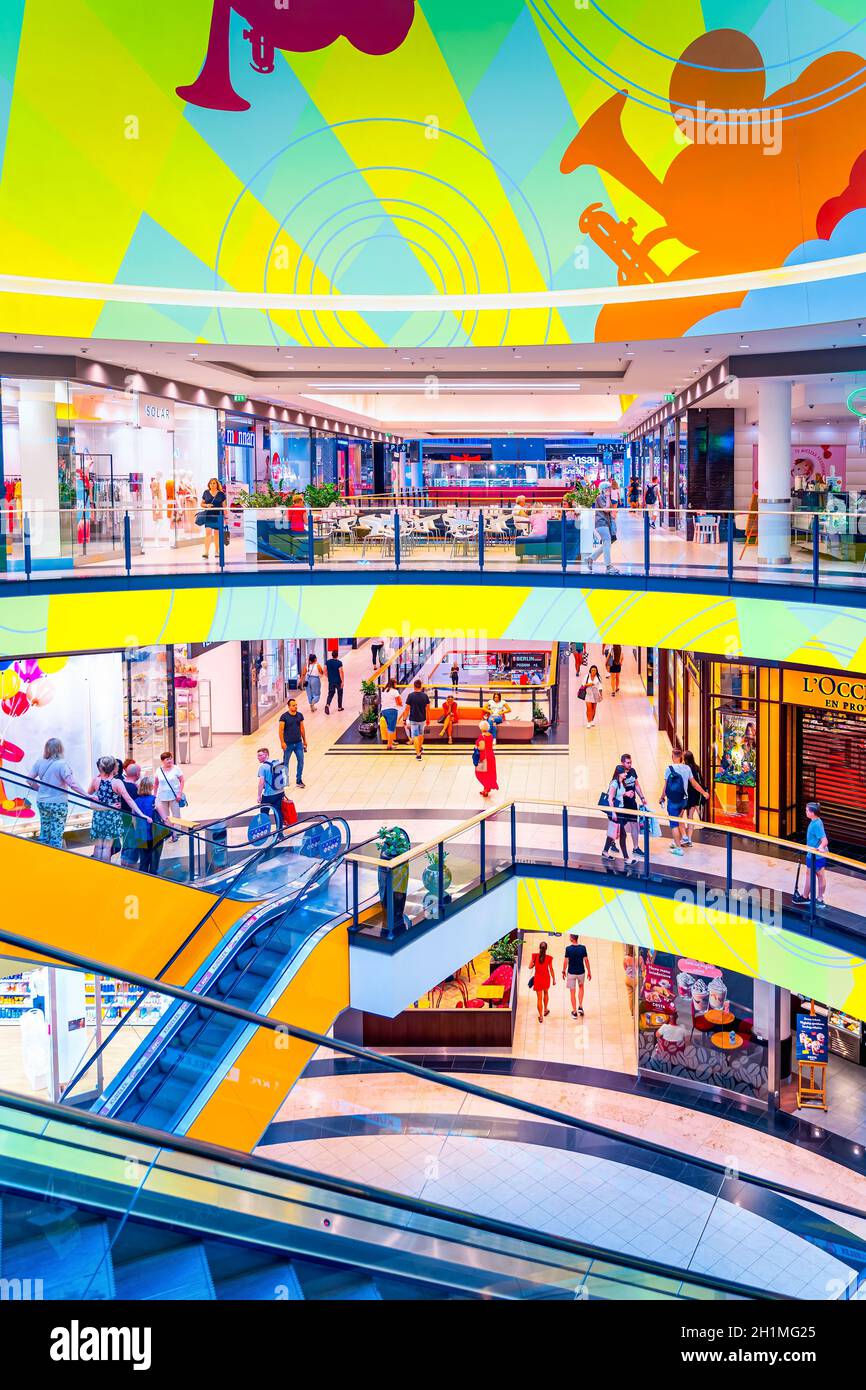 Szczecin, Poland June 2019 People in Galeria Kaskada, vibrant ...