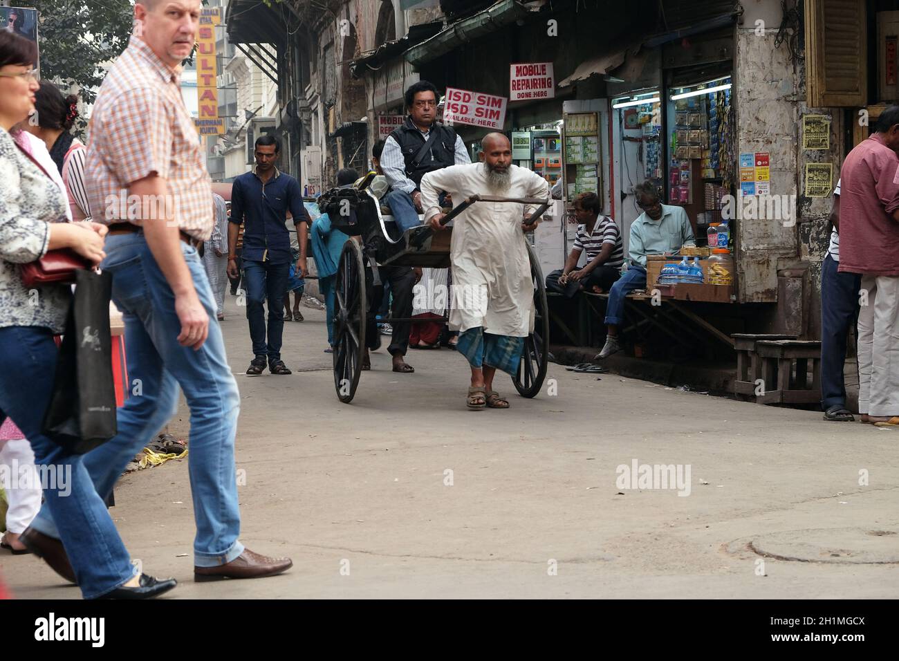 Human pulled rickshaw hi-res stock photography and images - Alamy
