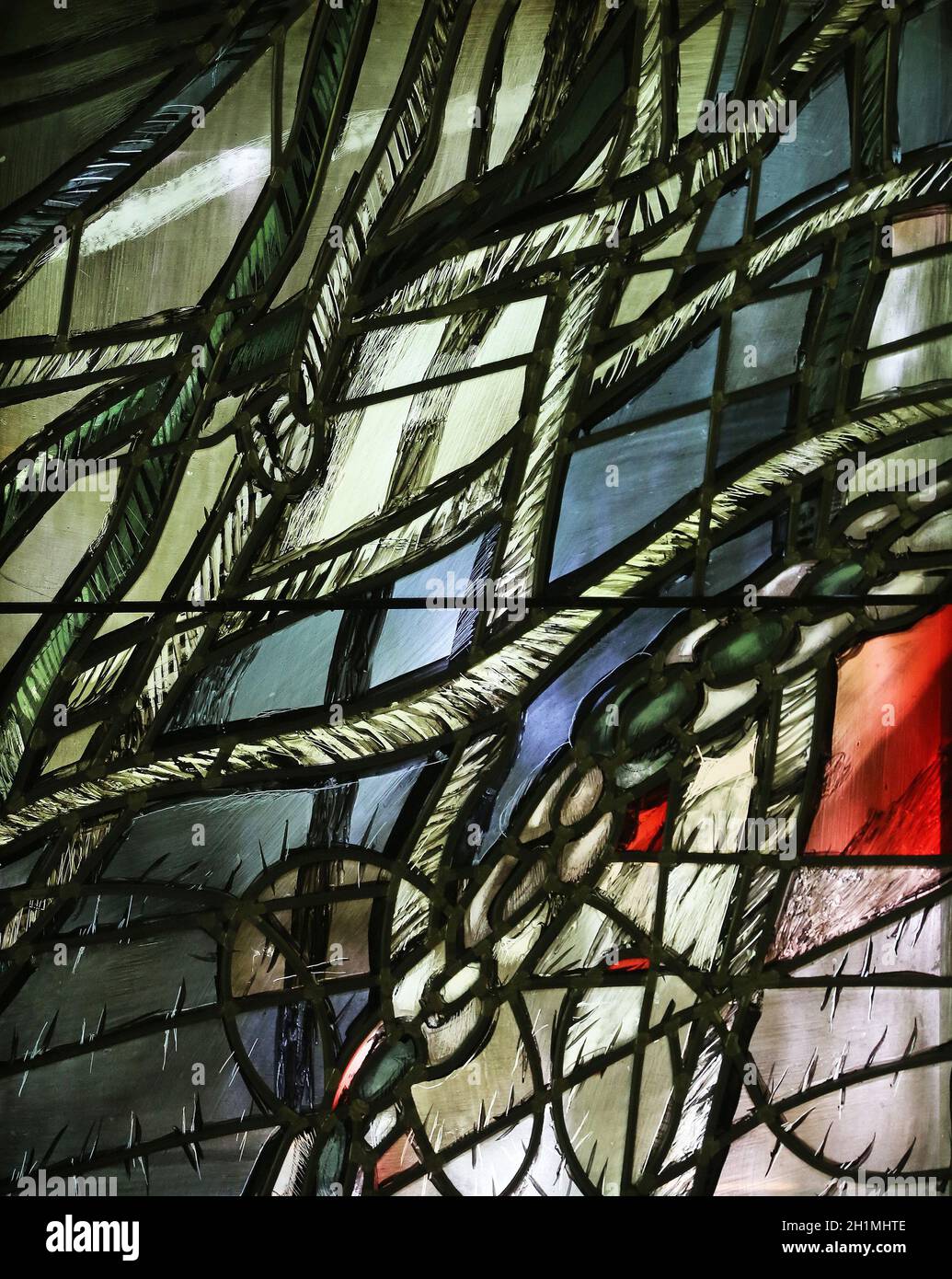 Simon of Cyrene carries the cross, detail of stained glass window by ...