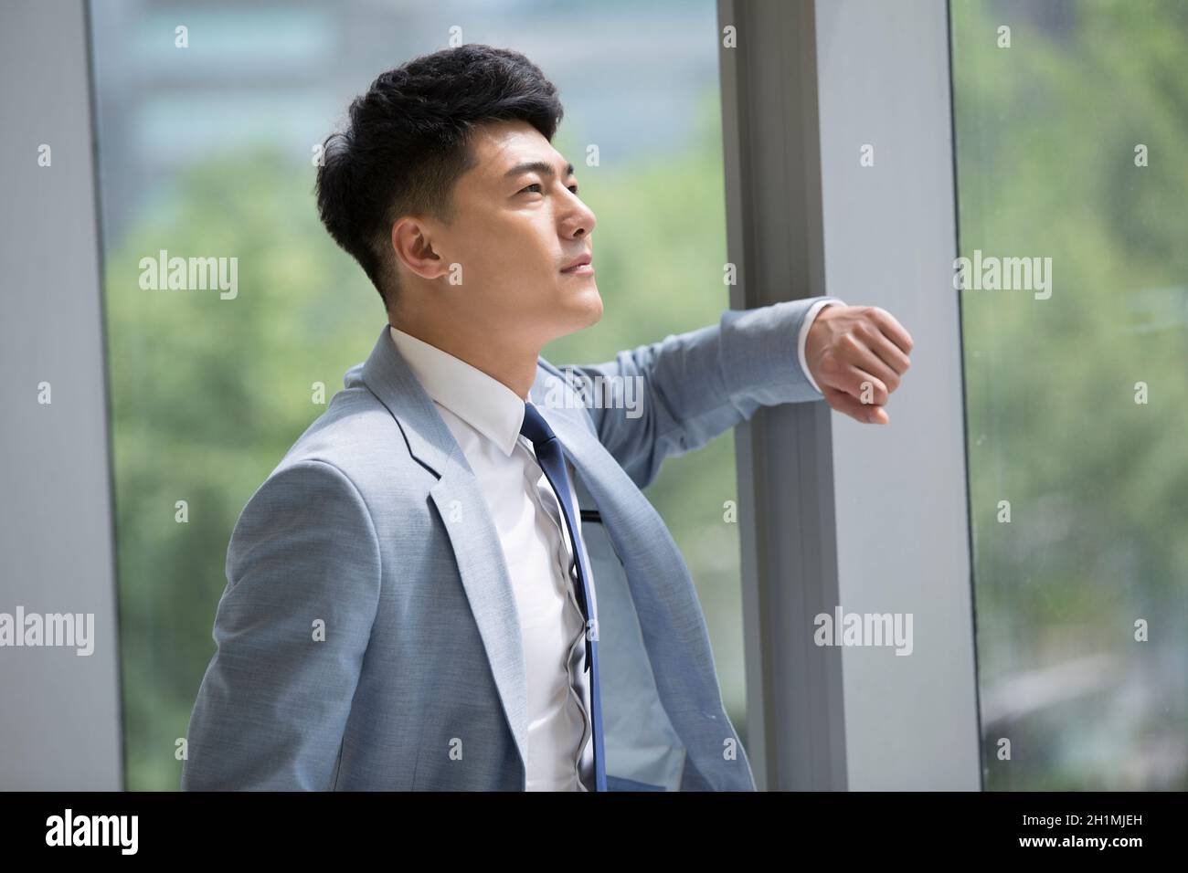 Person looking at a building hi-res stock photography and images - Alamy