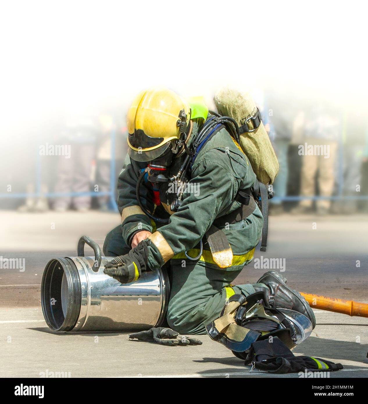 The Firefighter with fire fighting equipment and accessories Stock ...