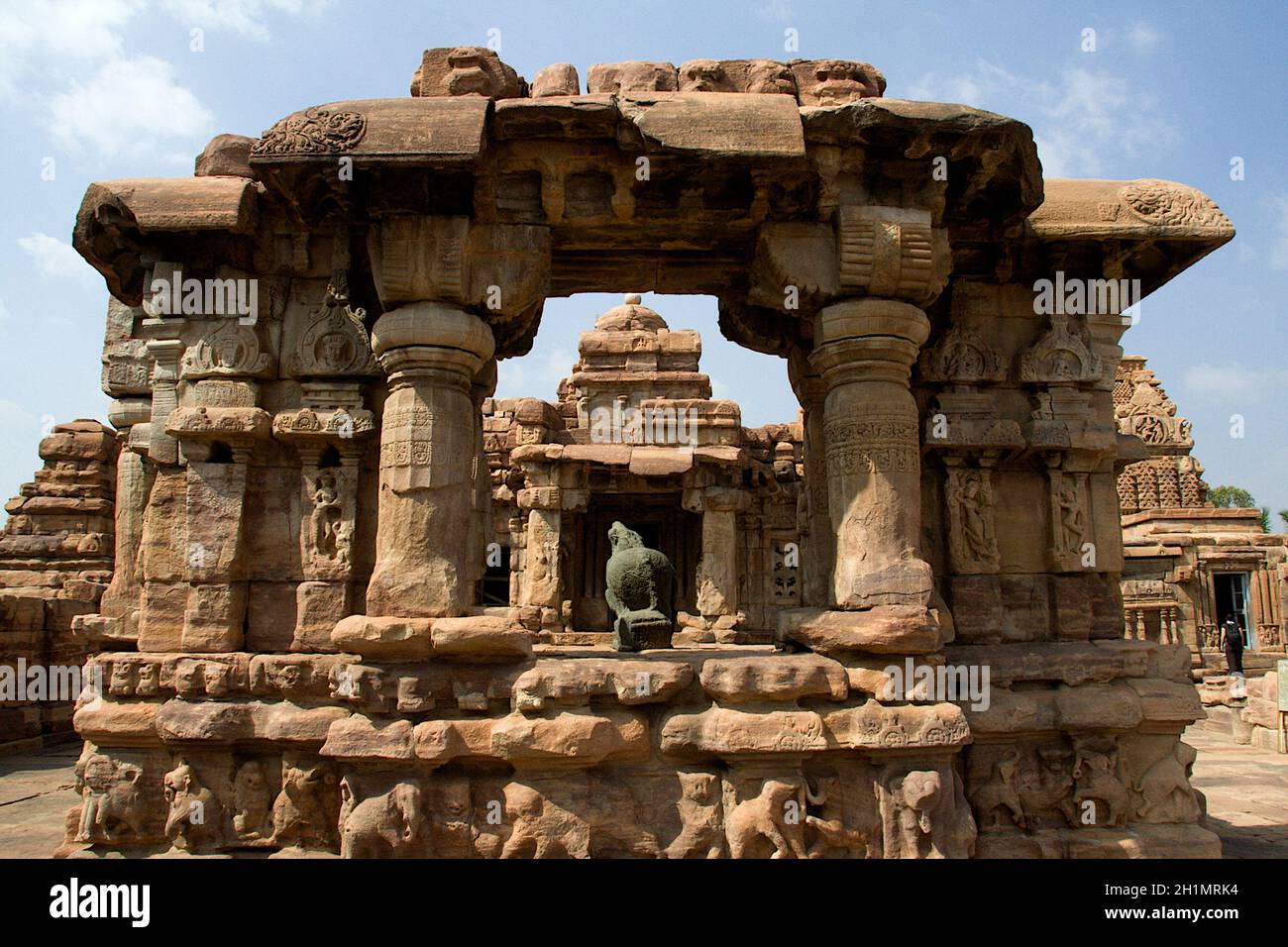Red stone Nandi Mantapa with black stone Nandi at centre in Pattadakal ...