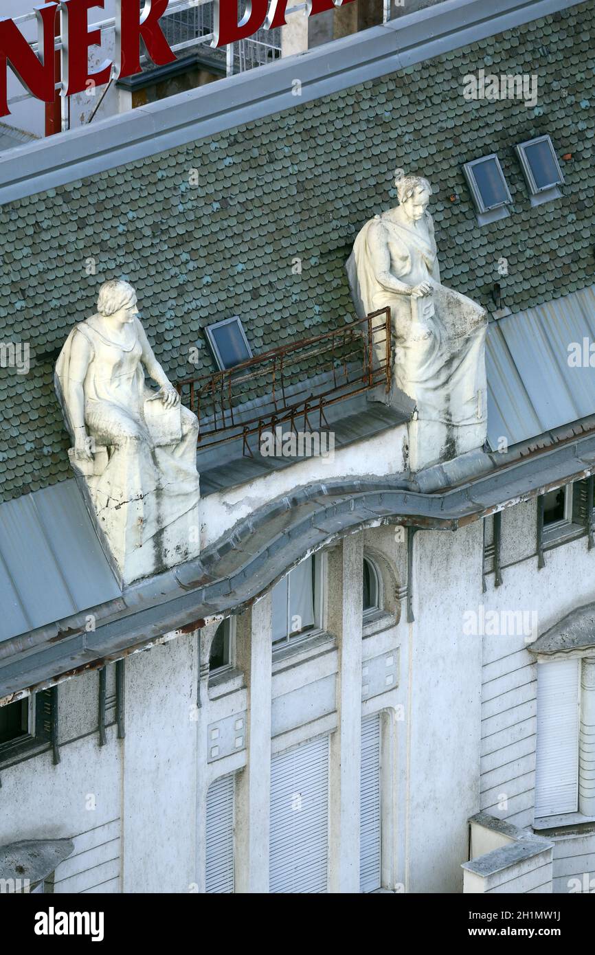 Statues on top of the old city buildings on Ban Jelacic Square in ...