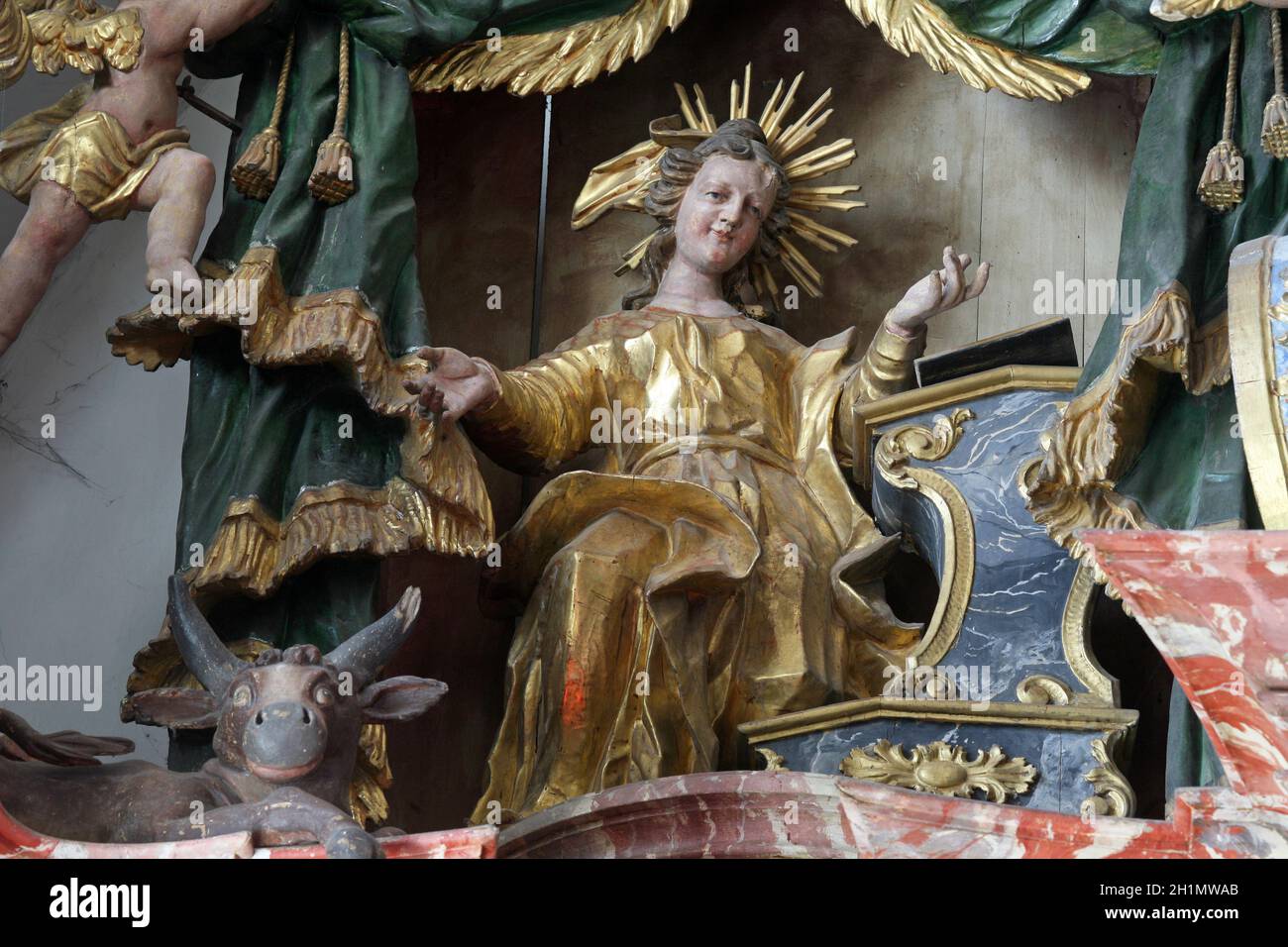 Saint Luke the Evangelist, statue on altar in cathedral of Assumption ...