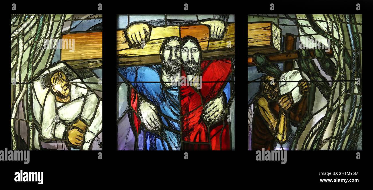 Simon of Cyrene carries the cross, stained glass window by Sieger Koder ...