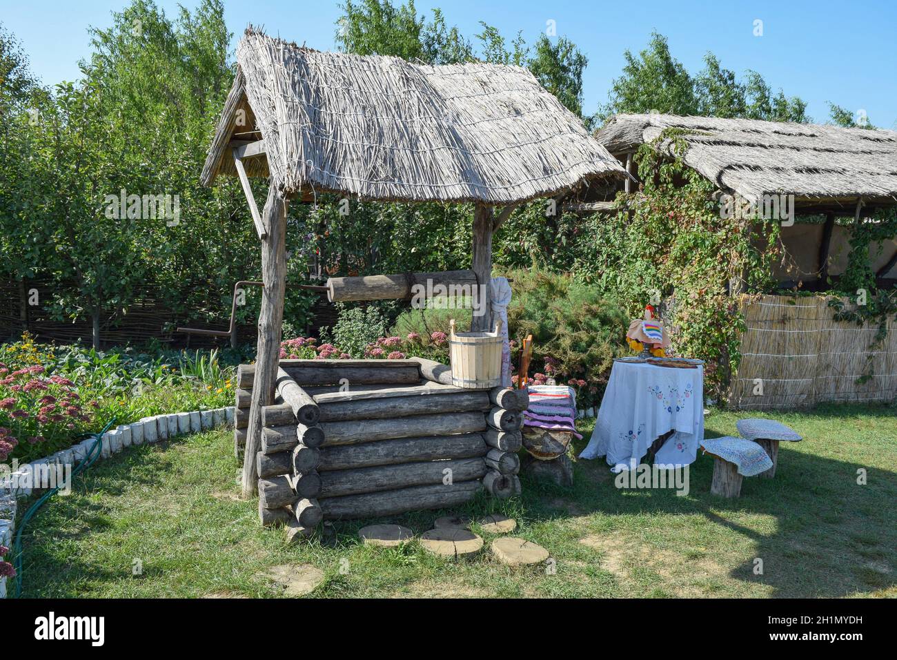 Brick water well wooden roof hi-res stock photography and images - Alamy