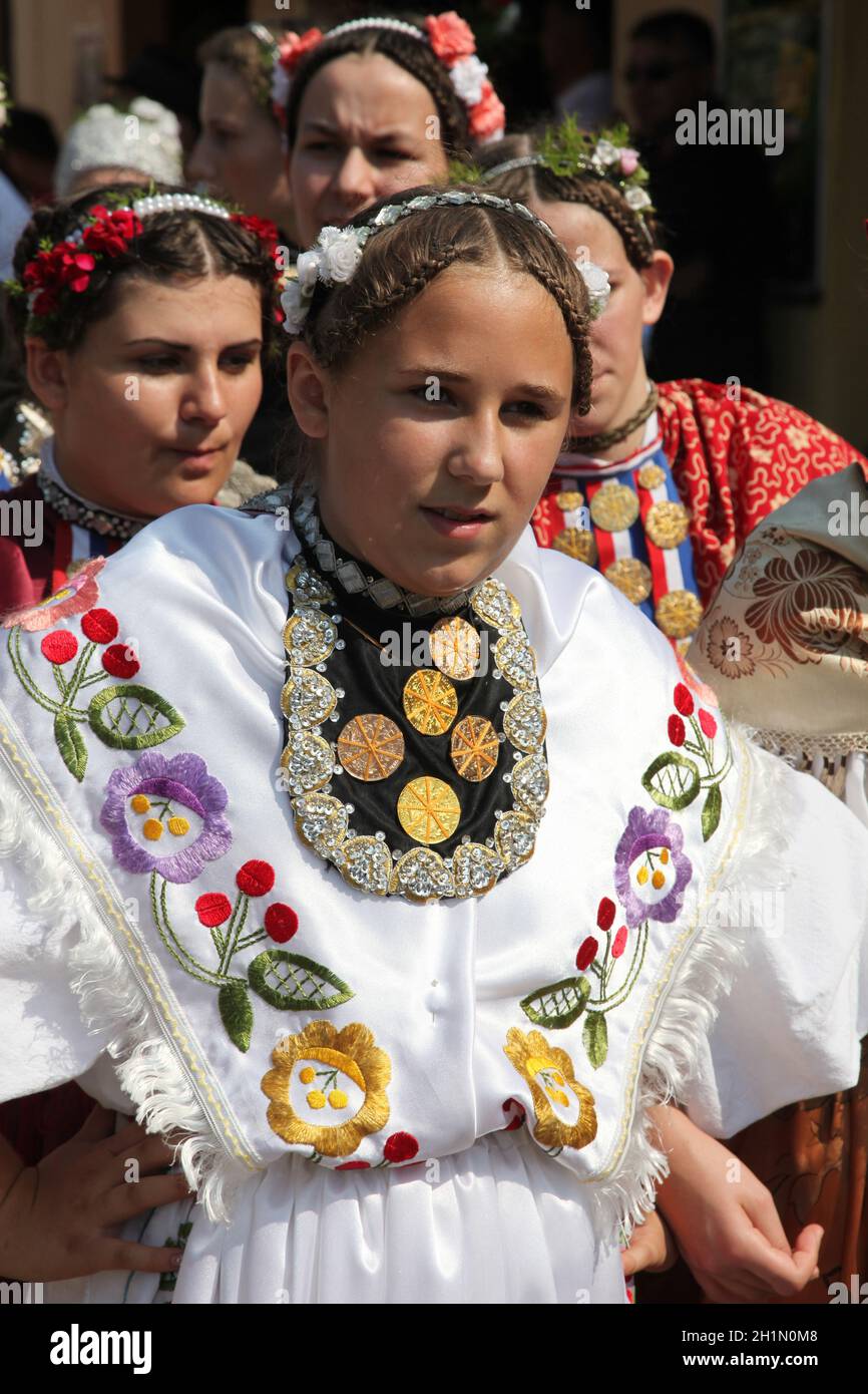 Participant in Croatian national costume from the village Siroko Polje ...